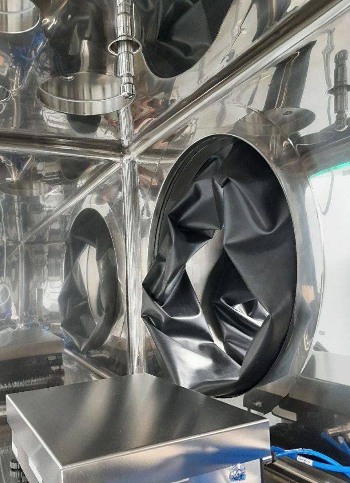 Powder handling Dispensing Isolator. - csv containment news
