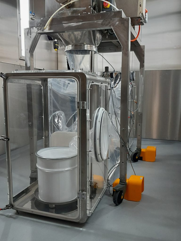 Contained Unloading System for a Rotating dryer trough a mill.