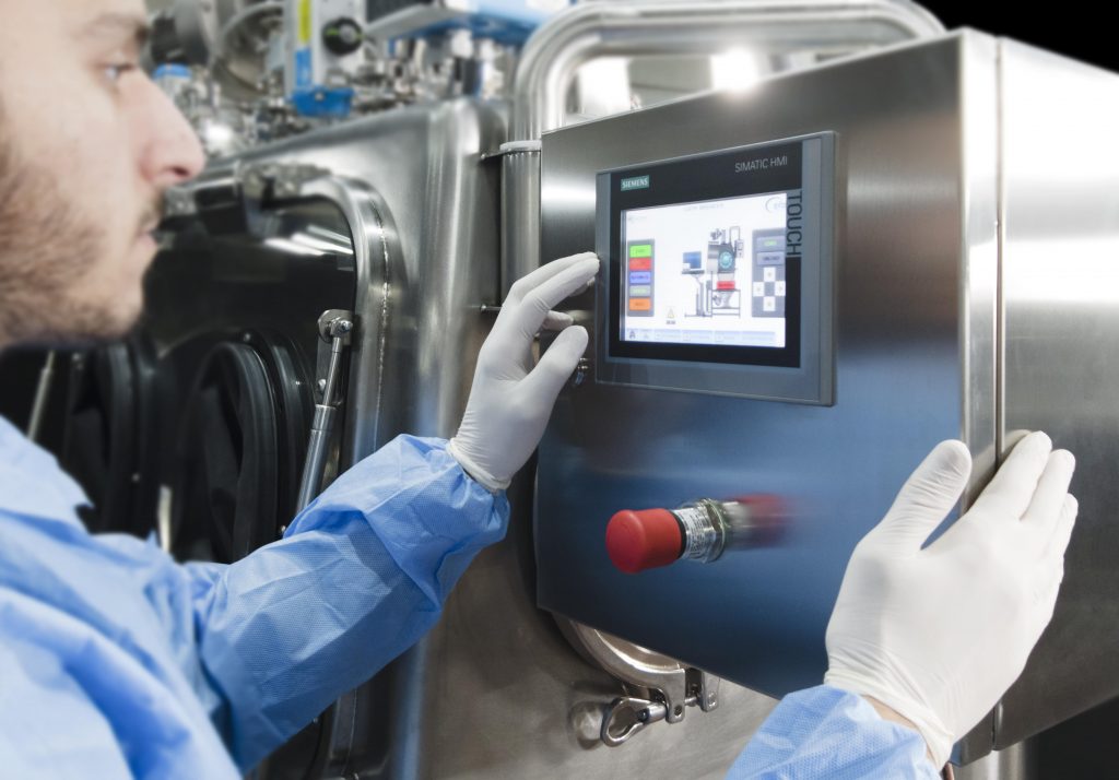 Fully automated contained Drum Handling system with Lump Breaker.